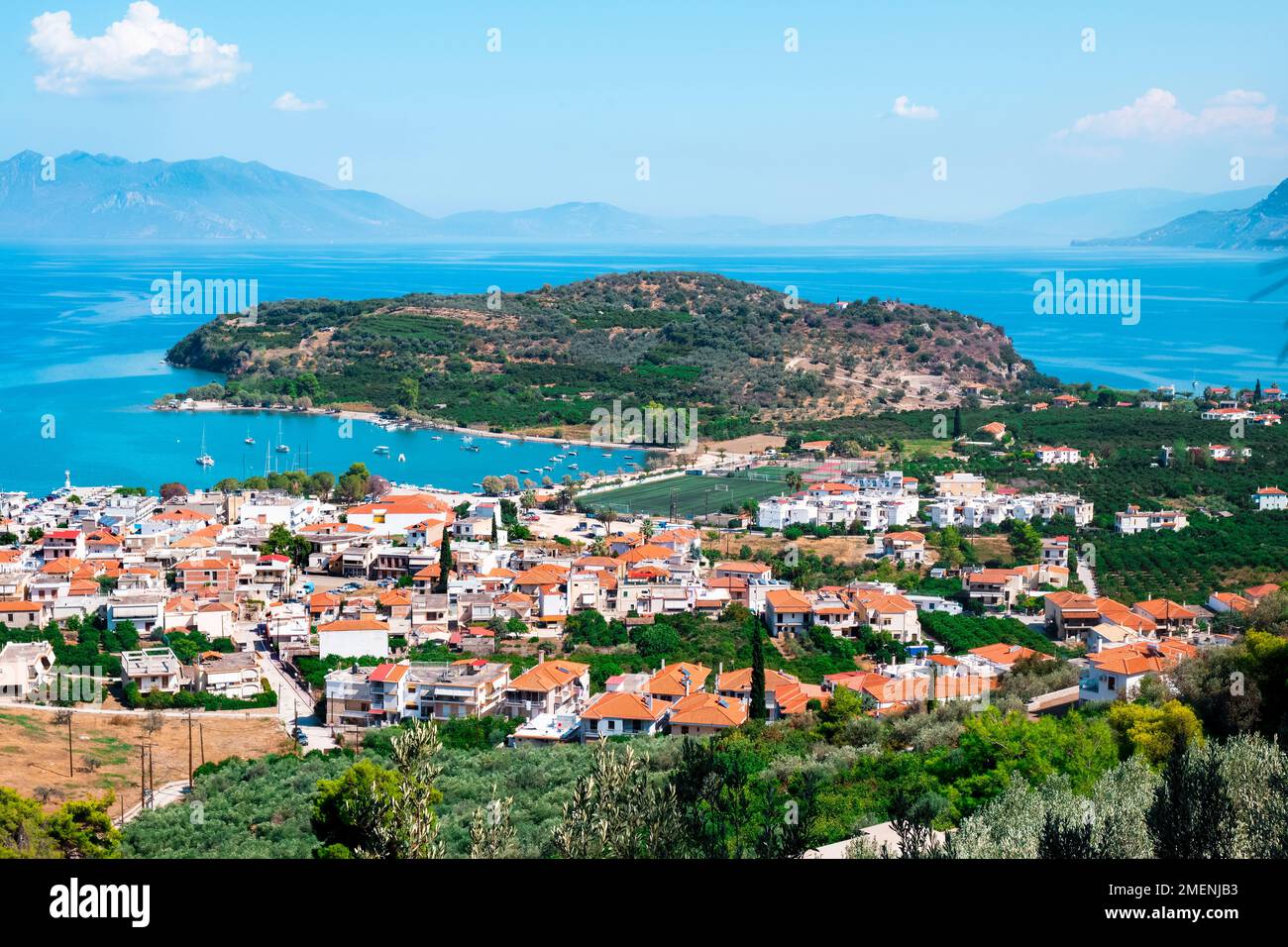 a view over Palaia Epidavros, in Greece, and the small theater of the ...