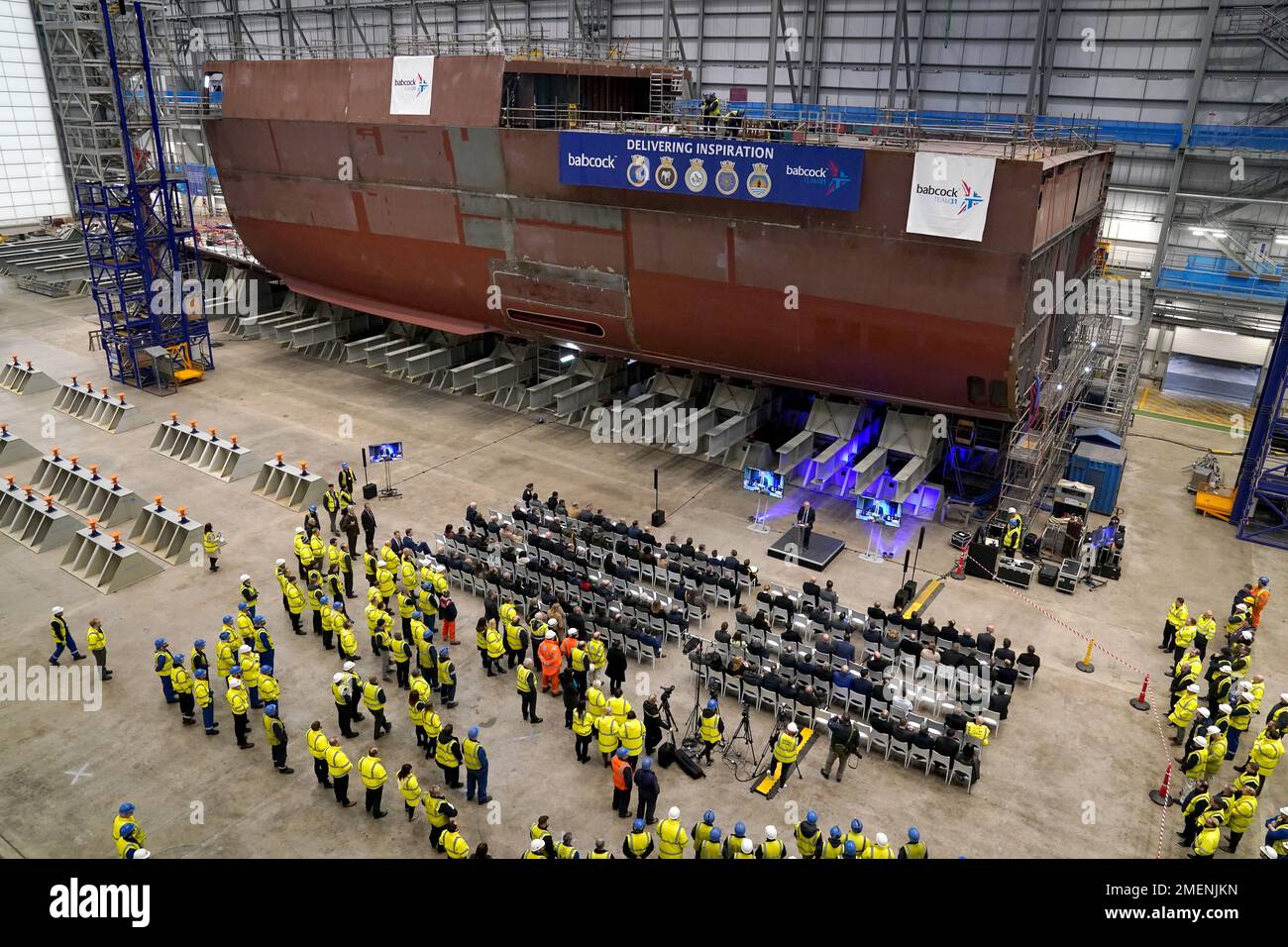 Workers look on at HMS Ventura in the Ventura building after a ceremony ...