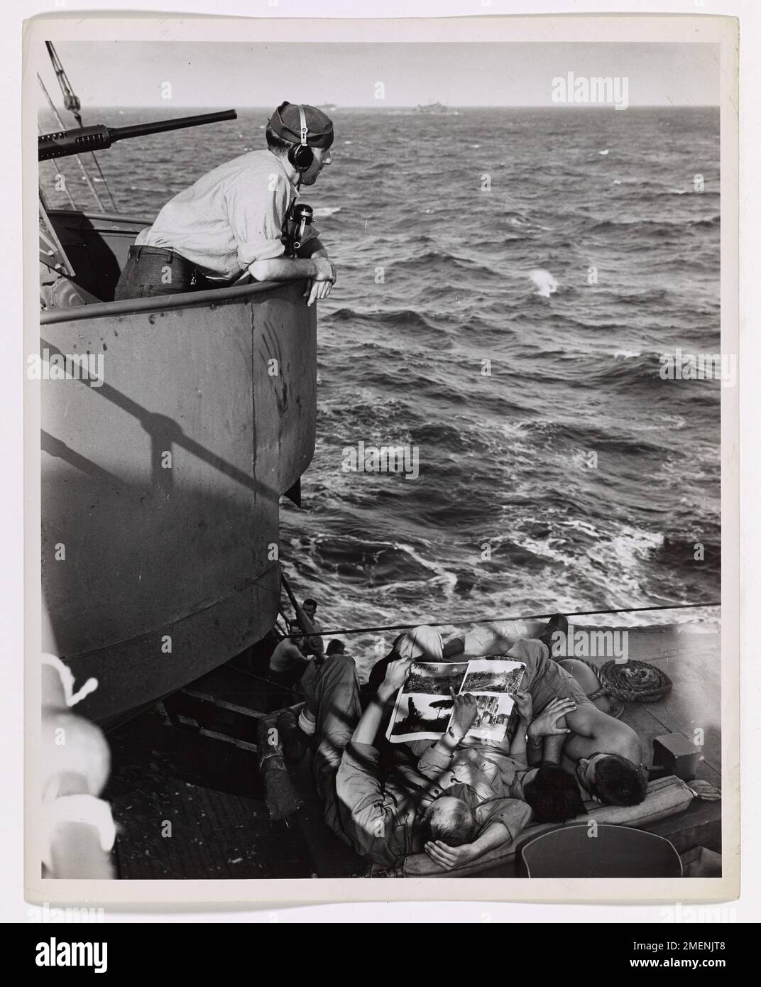A U.S. Coast Guard-manned transport ship heads toward Makin Island in ...