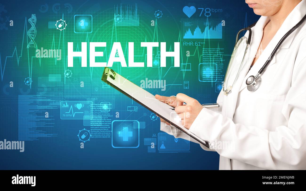 young doctor writing down notes Stock Photo - Alamy