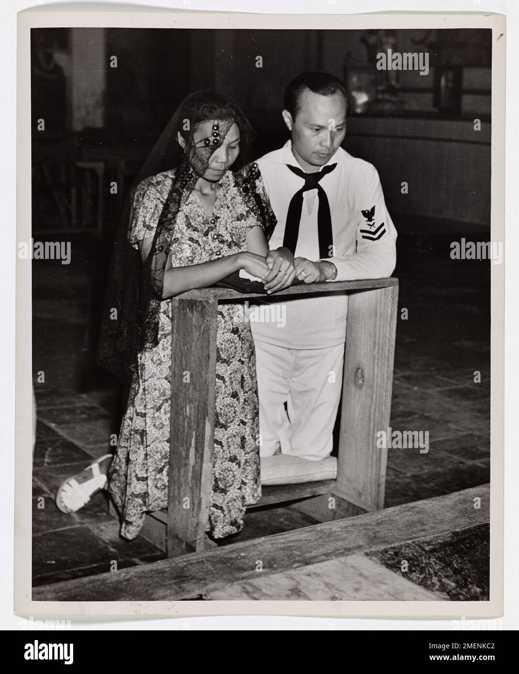 Coast Guardsman Precioso M. Nicanor and his wife express their ...