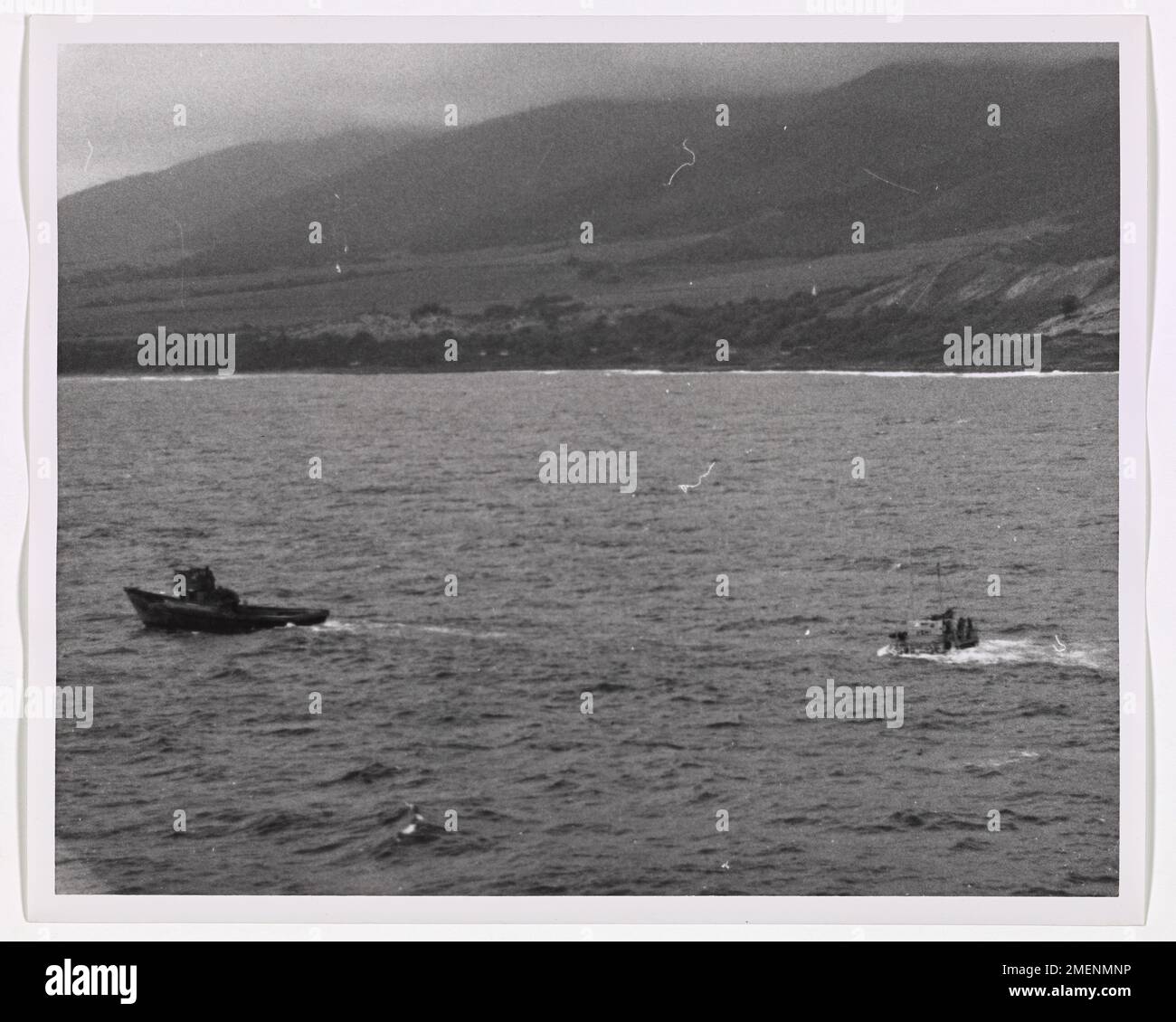 A Coast Guard plane assists the fishing vessel AMBERJACK as it tows the ...