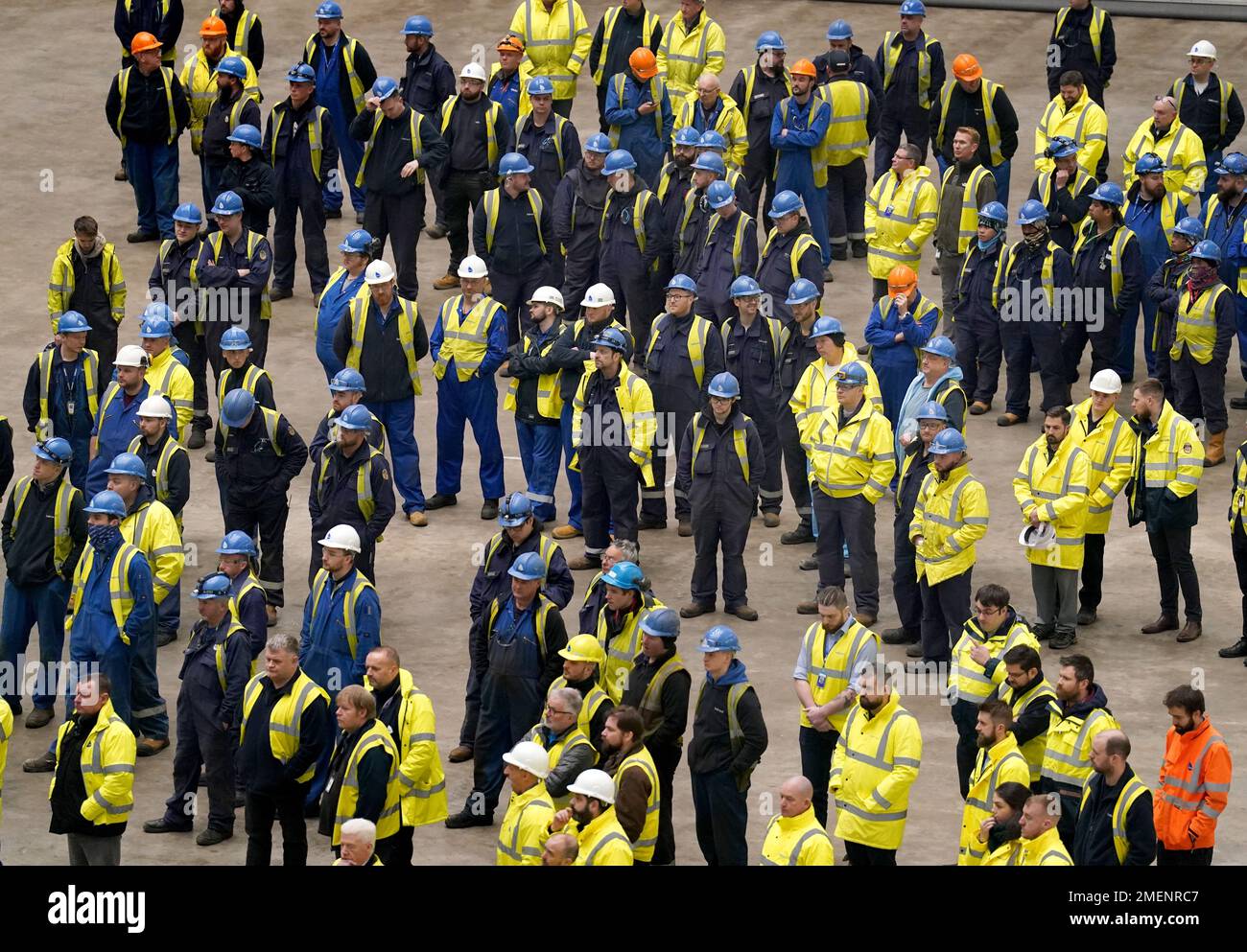 Workers look on at HMS Ventura in the Ventura building after a ceremony ...