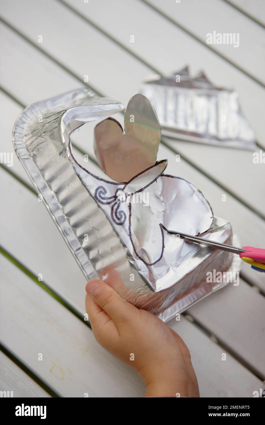 cutting out butterfly with scissors Stock Photo - Alamy