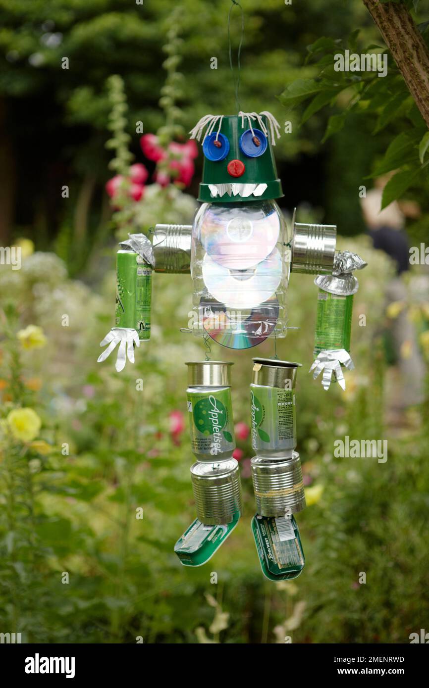 friendly scarecrow hanging in the garden Stock Photo - Alamy