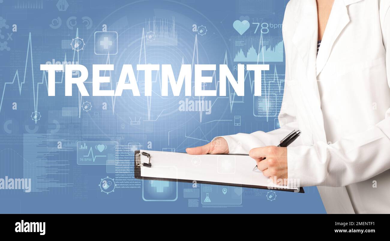 young doctor writing down notes Stock Photo - Alamy