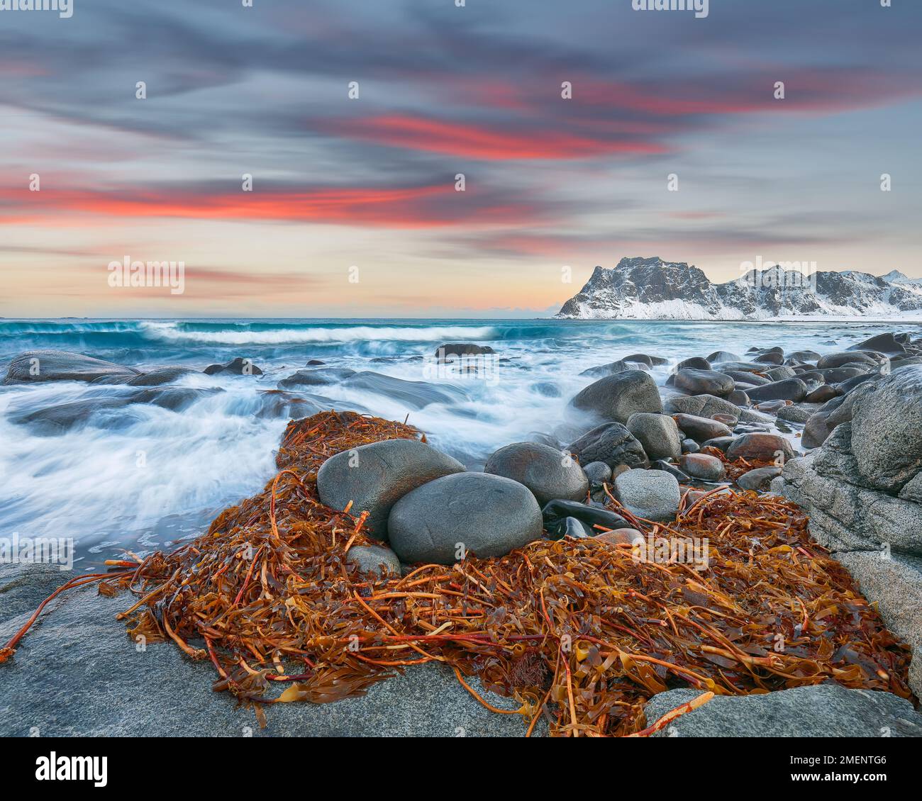 Fabulous winter scenery on Uttakleiv beach at morning. Popular tourist ...