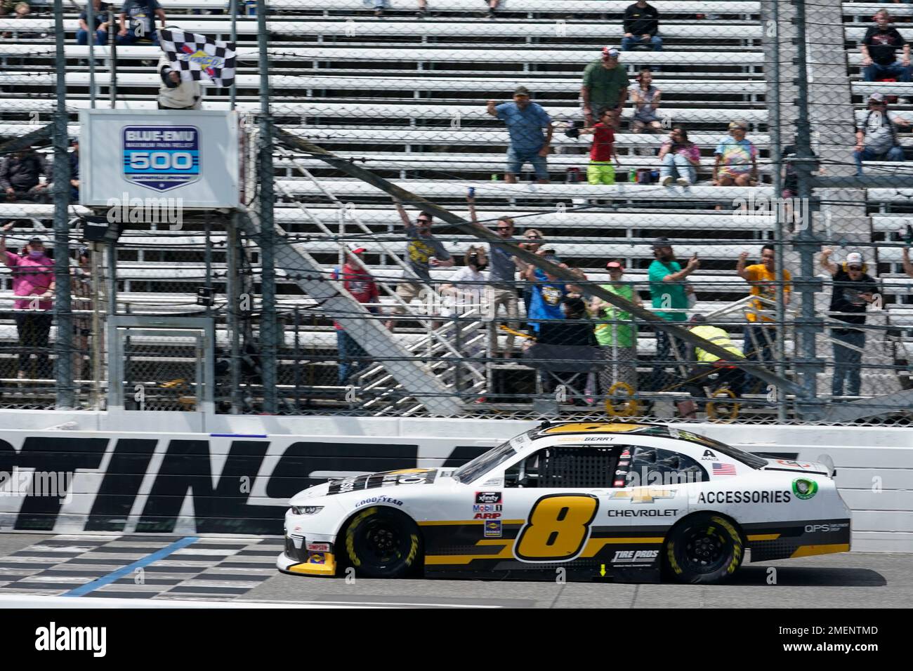 Josh Berry (8) crosses the finish line to win the rain delayed NASCAR ...