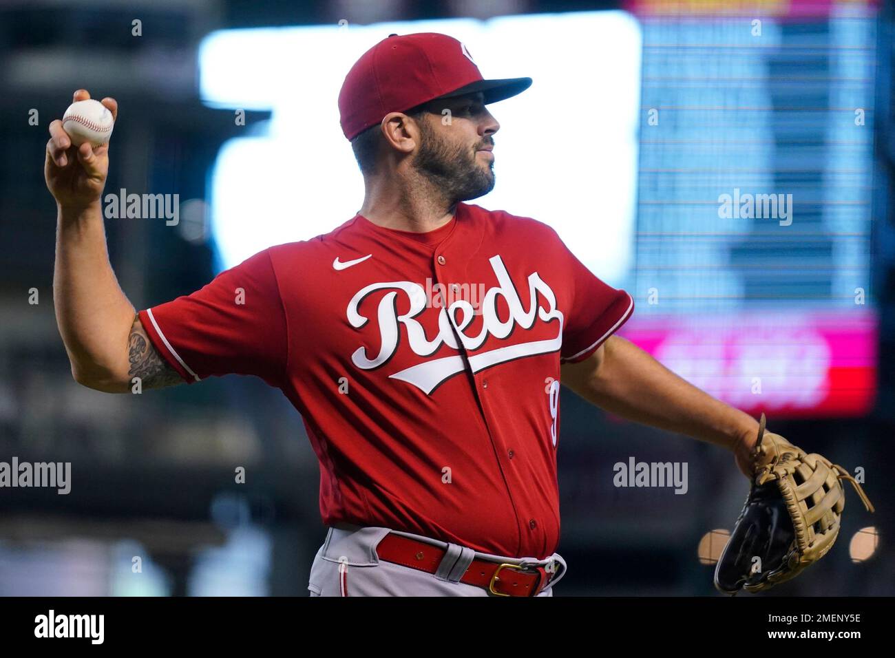 Cincinnati Reds' Mike Moustakas warms up prior to a baseball game ...