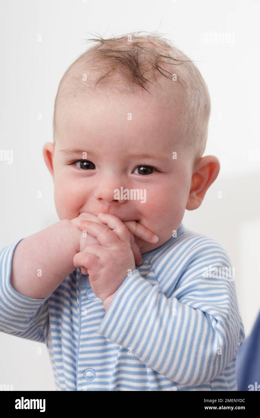 Chewing baby hi-res stock photography and images - Alamy
