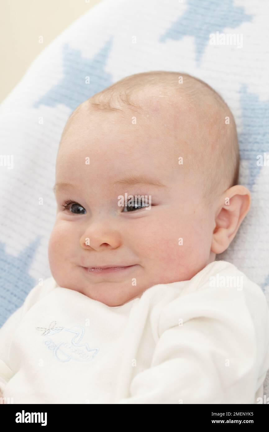 Baby boy (16 weeks) smiling Stock Photo - Alamy