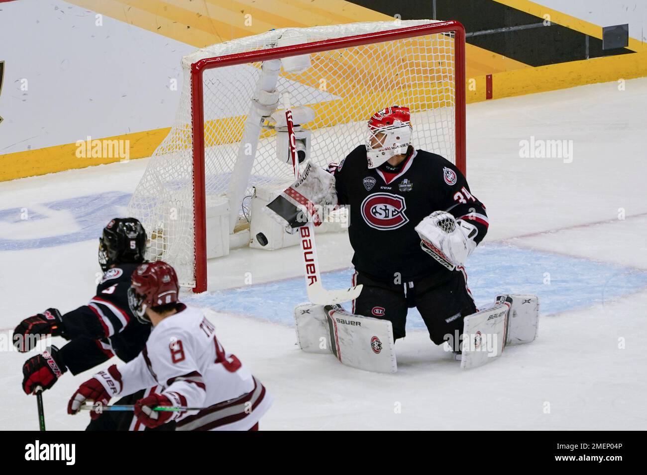 Massachusetts's Bobby Trivigno (8) scores against St. Cloud State ...