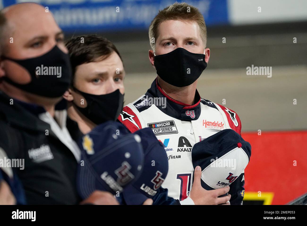 William Byron, right, stands with his pit crew during opening ...