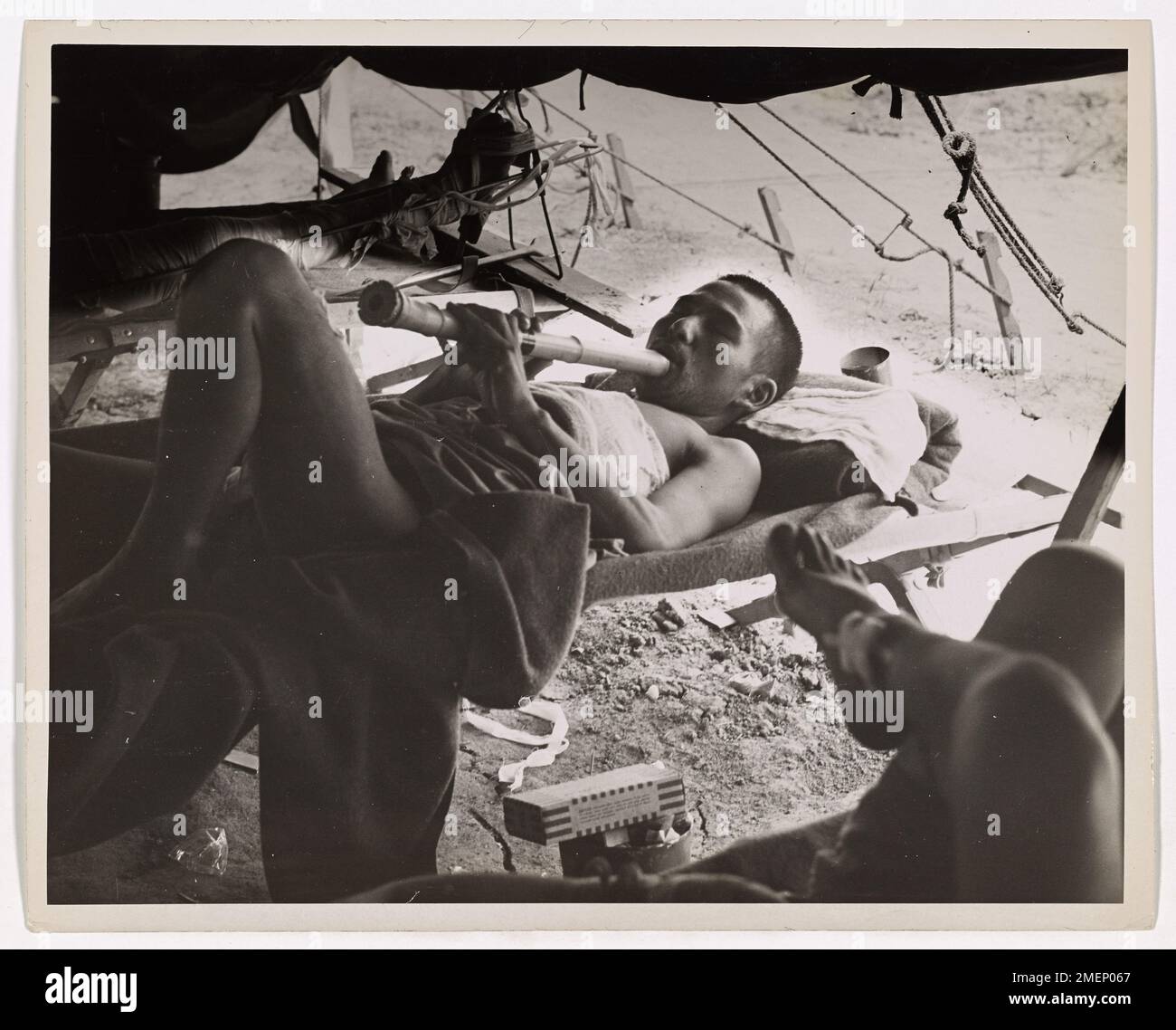 This image depicts a captured Japanese soldier at an evacuation ...