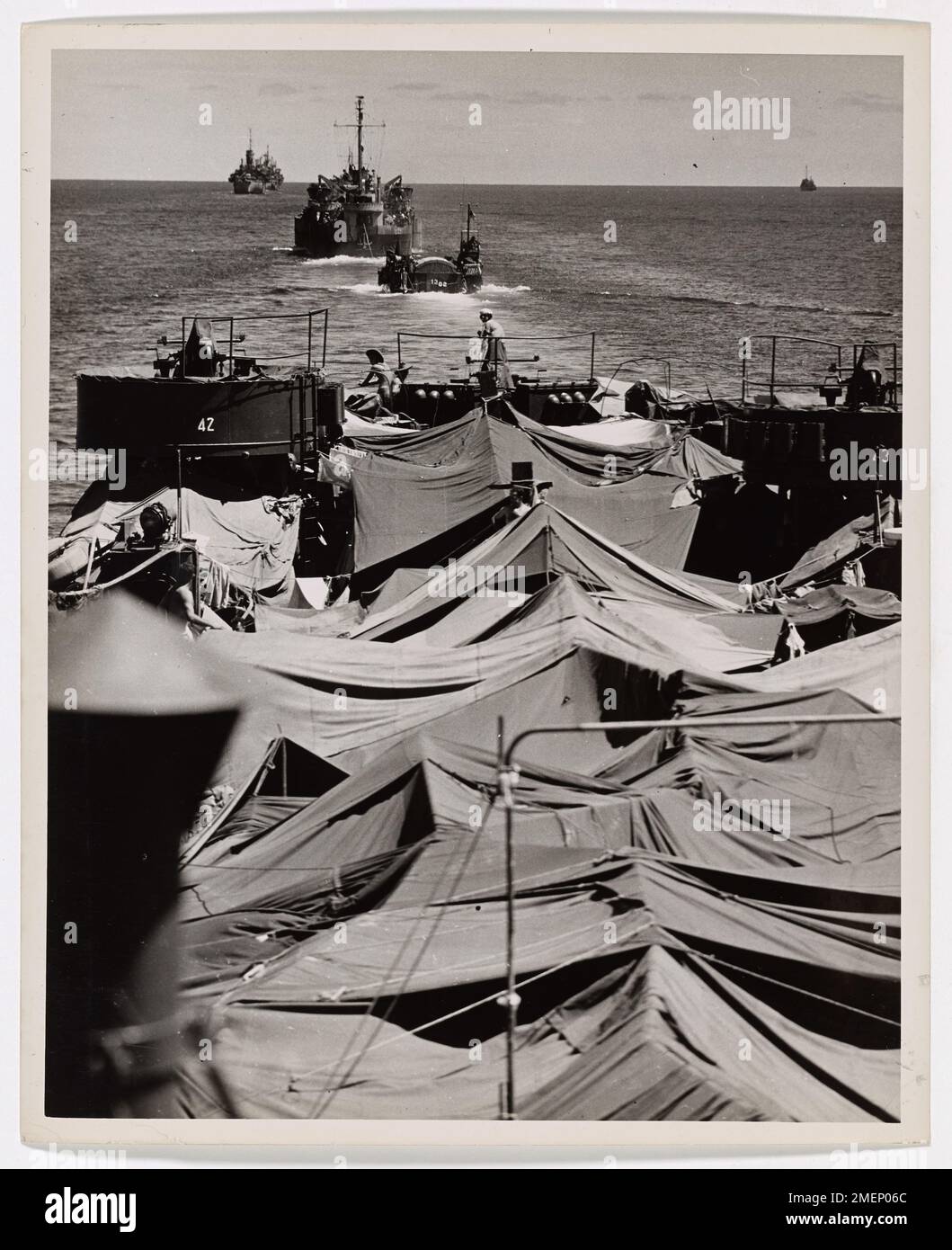 Australian soldiers aboard a Coast Guard-manned LST head for Balikpapan ...