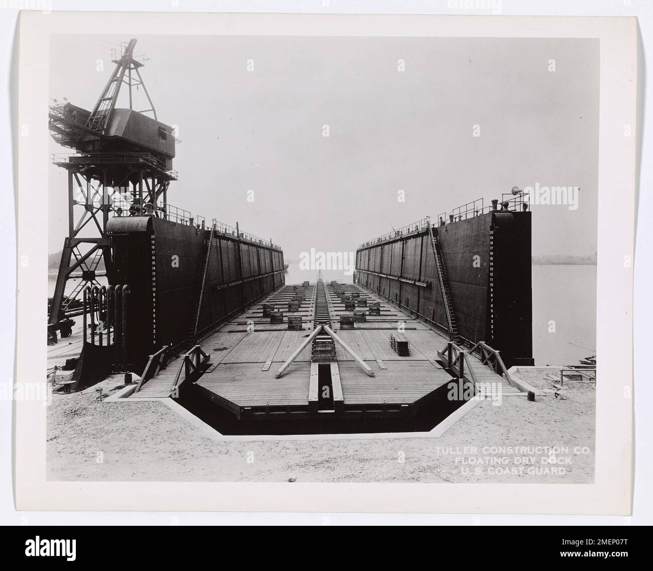 This image depicts a floating dry dock from Tuller Construction Co ...