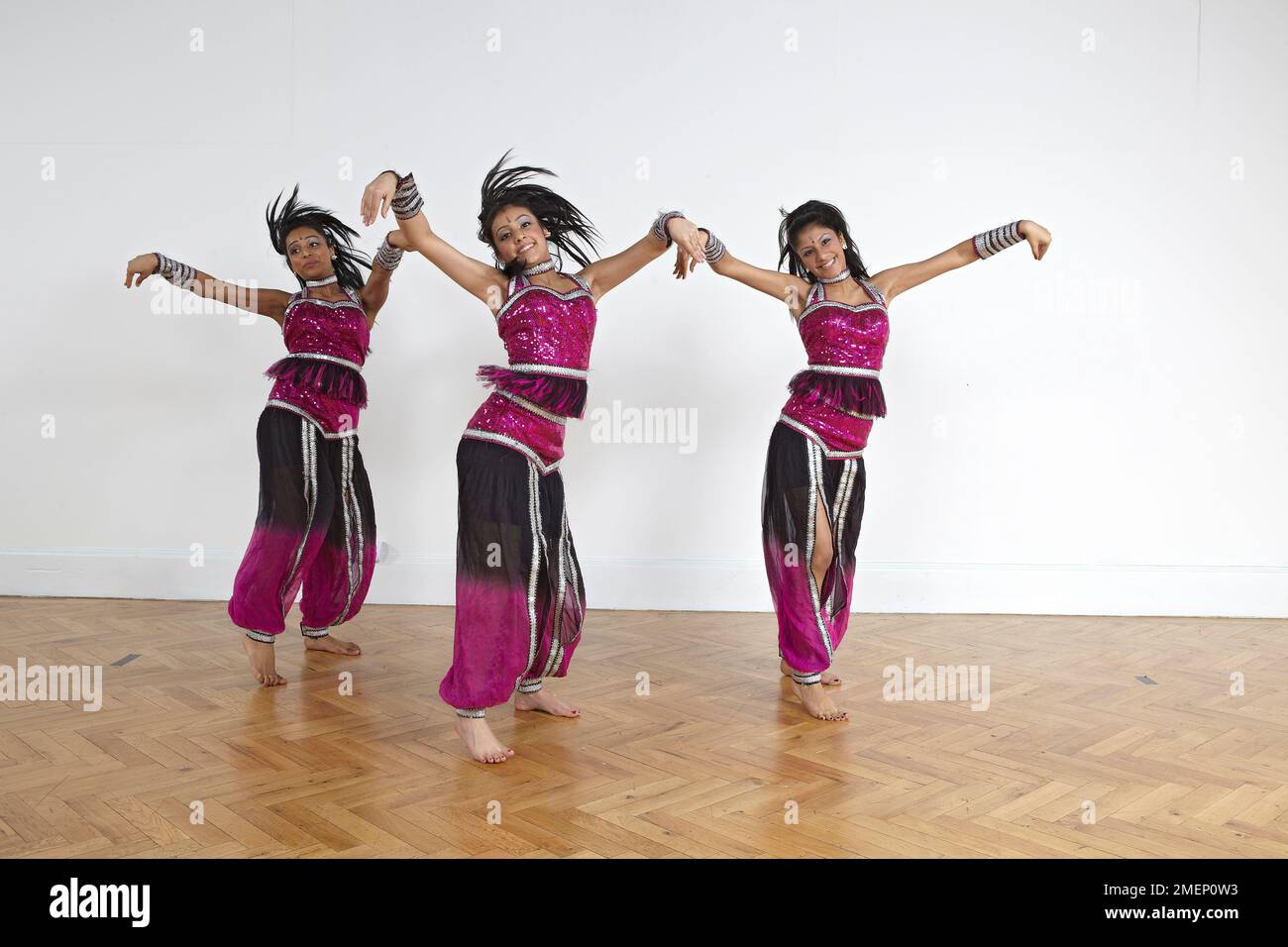 Teenage girls performing Bollywood dance moves (formation Stock Photo ...
