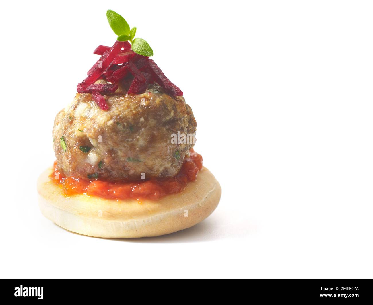 Canape burger topped with beetroot Stock Photo - Alamy