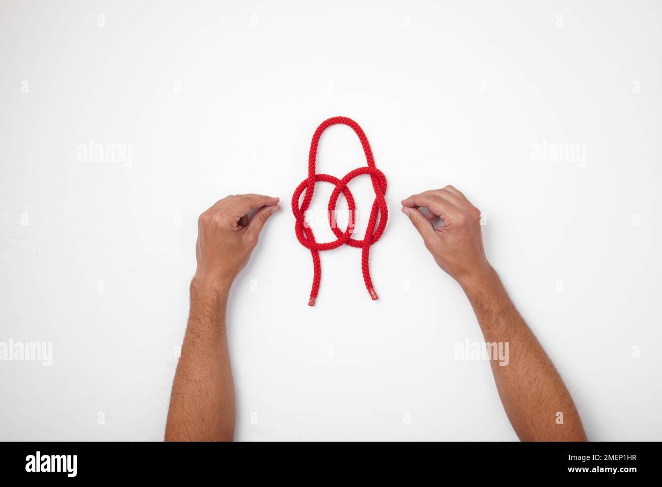 Sailor's Cross - Step 5, reach through and grip (binding knot Stock ...