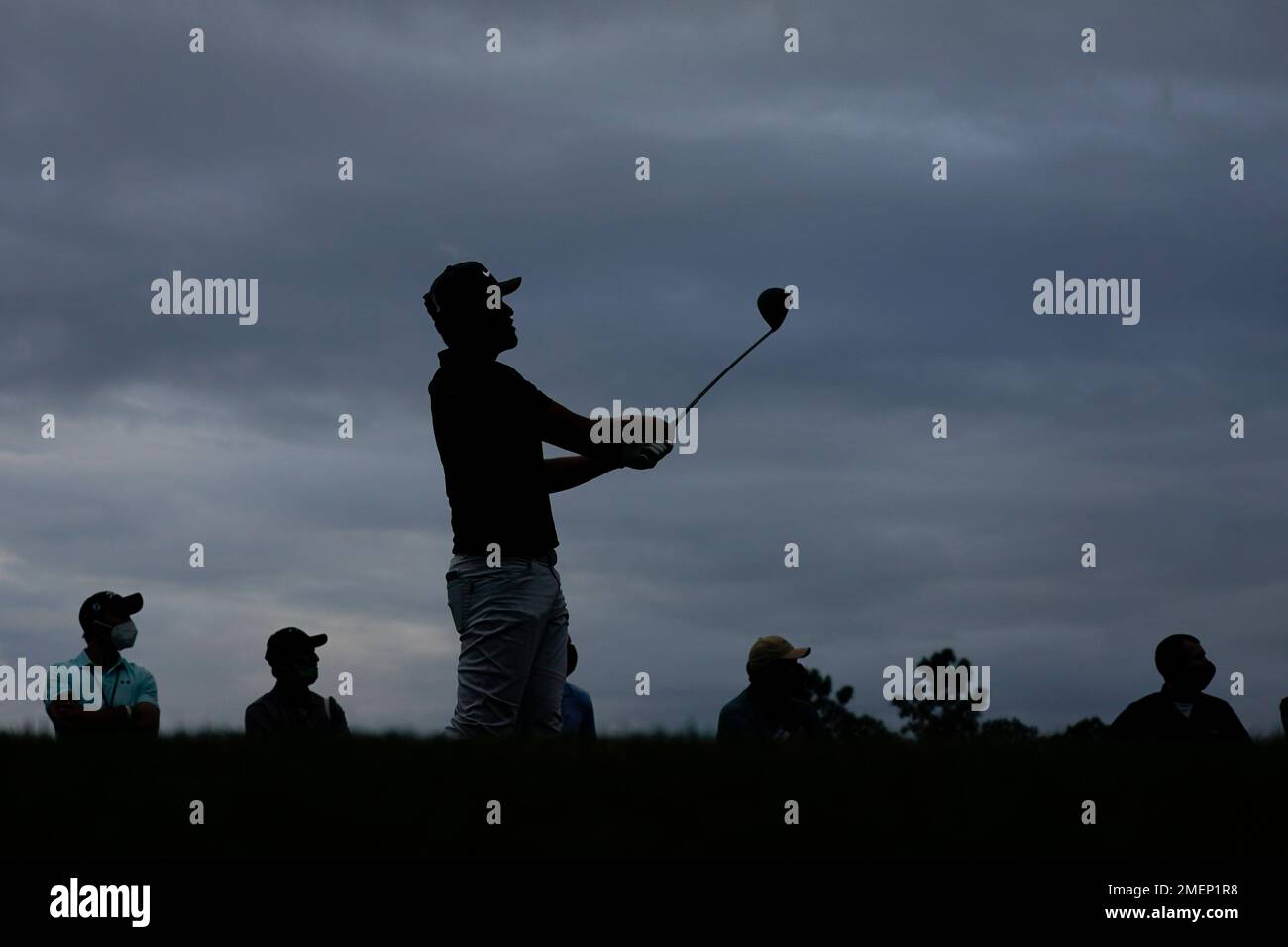 Tony Finau watches his tee shot on the 18th hole during the third round ...