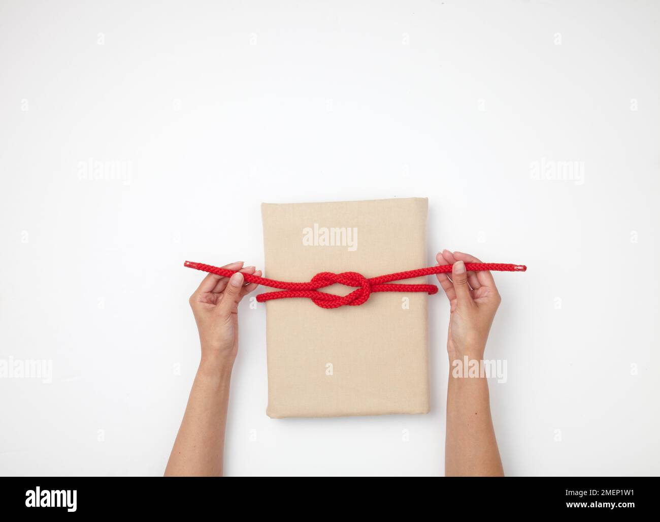 Reef Knot - Step 5 (a simple binding knot to secure a rope around an ...