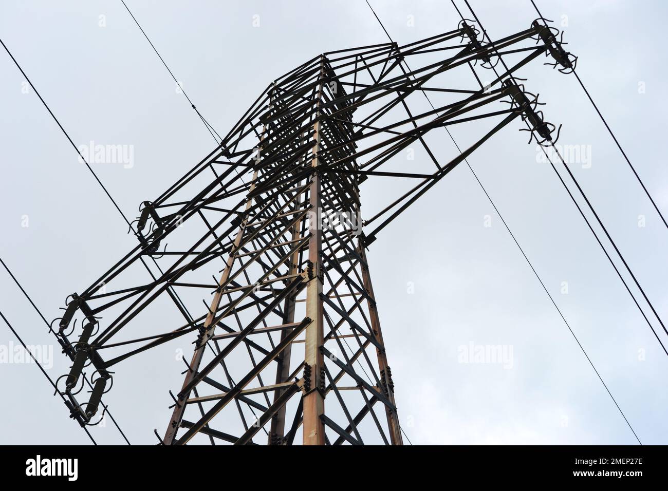 Electricity pylon view from below Stock Photo - Alamy