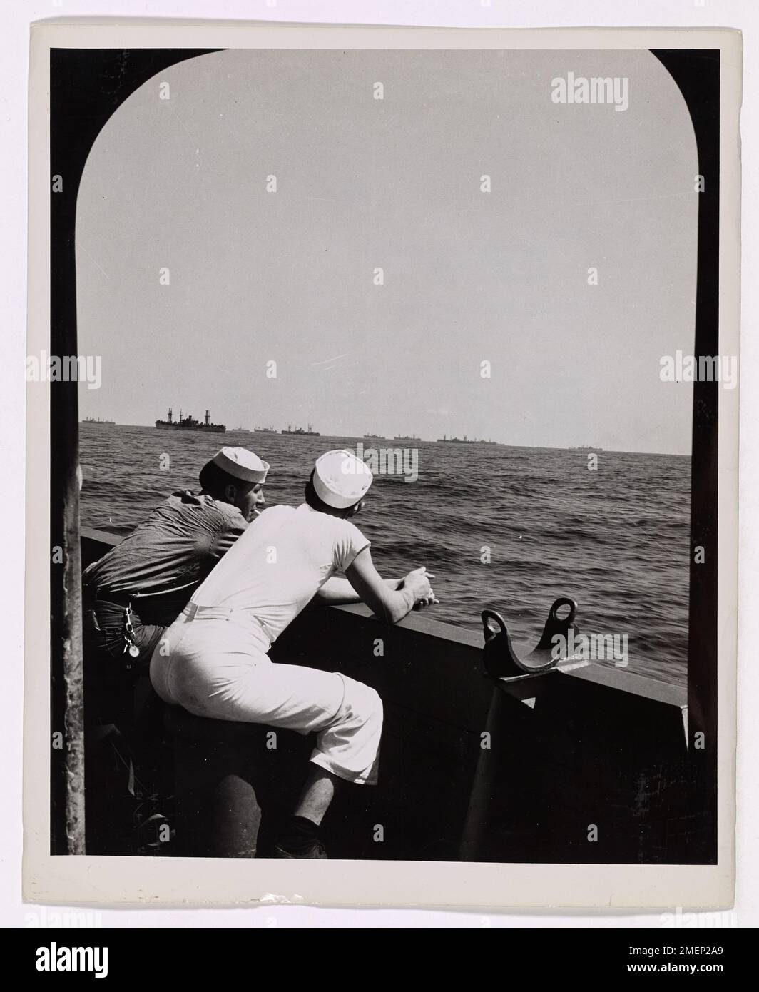 Coast Guardsmen aboard a combat cutter in the North Atlantic watch a ...