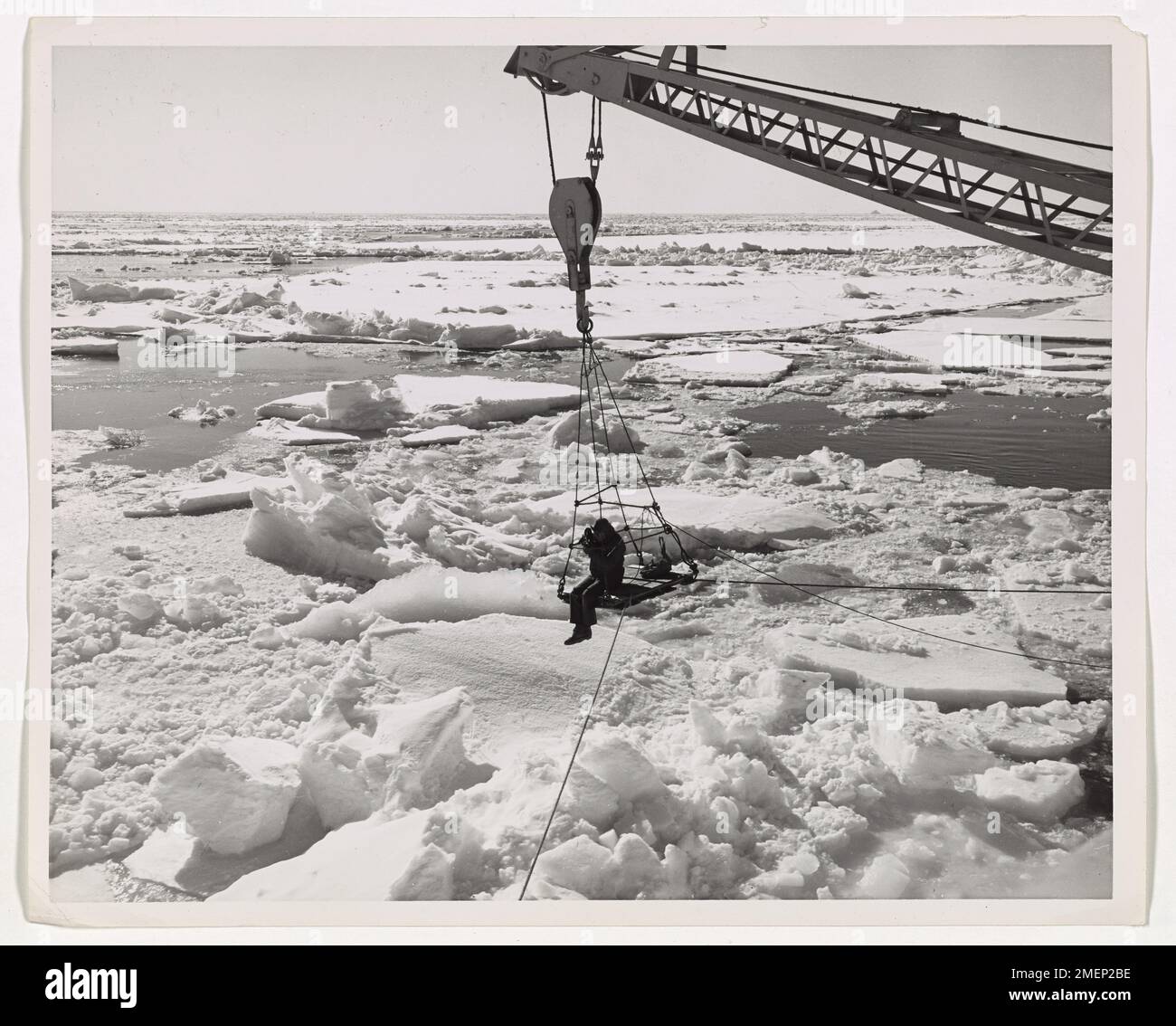 Coast Guard photographer Elmo Jones is seen shooting from the crane on ...