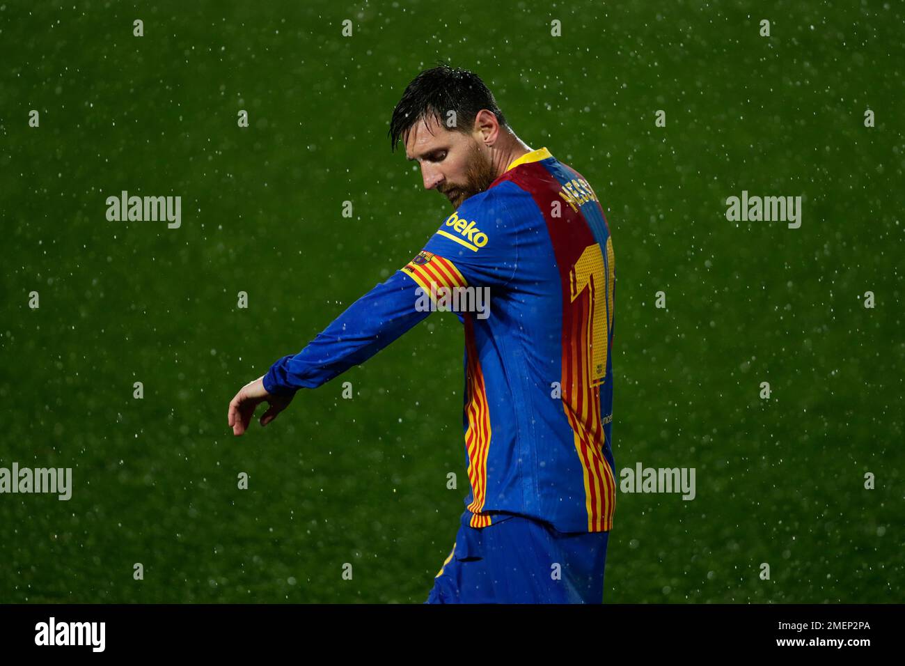 Barcelona's Lionel Messi adjusts his armband during the Spanish La Liga ...