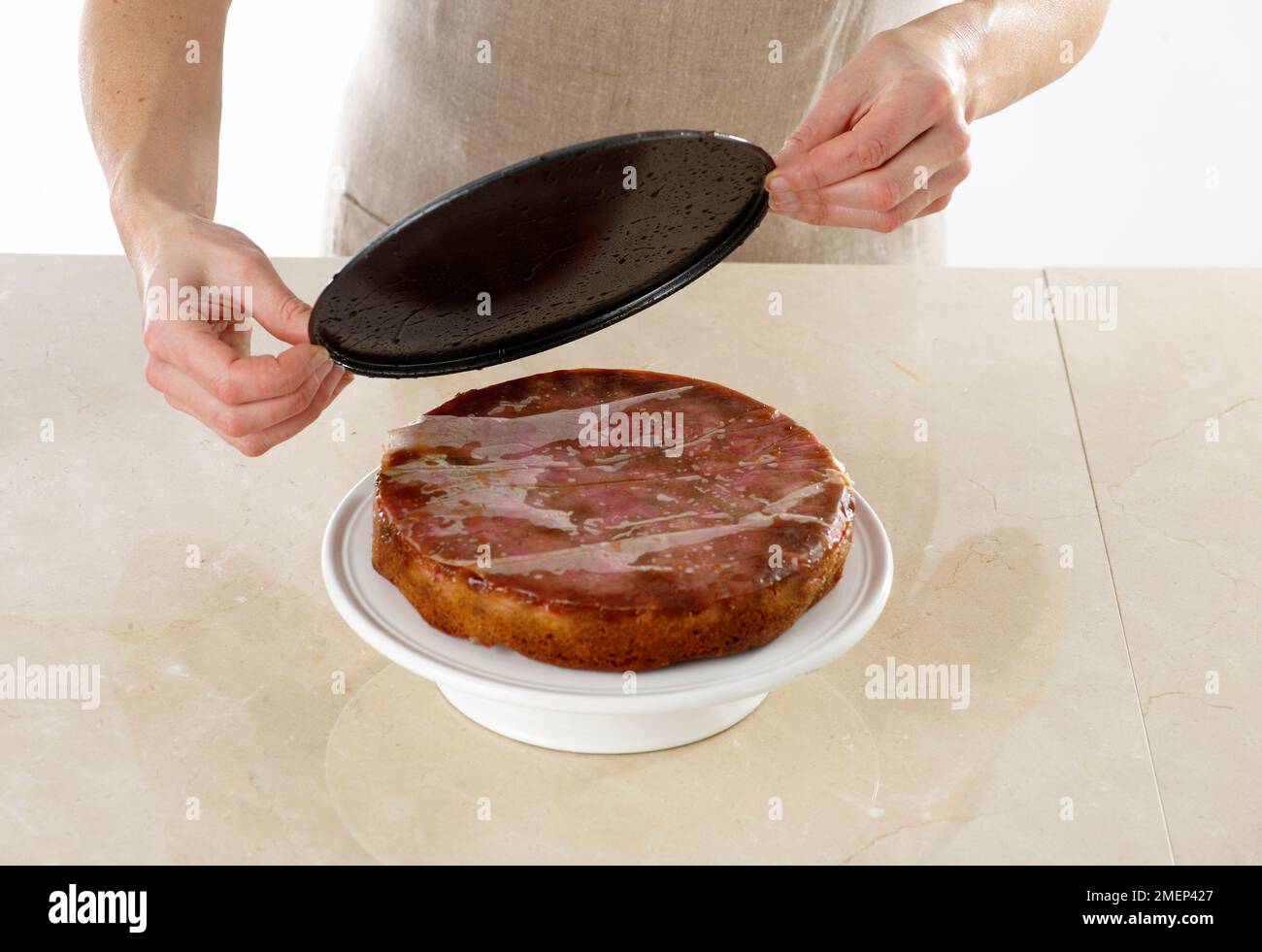 Baking sheet upside down hi-res stock photography and images - Alamy