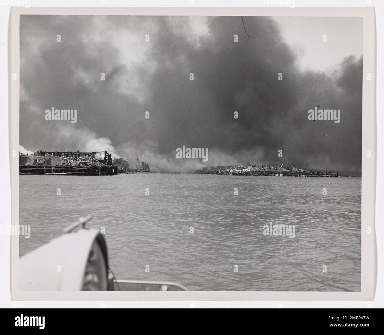 A photograph showing the aftermath of the explosion of the U.S. Navy's ...