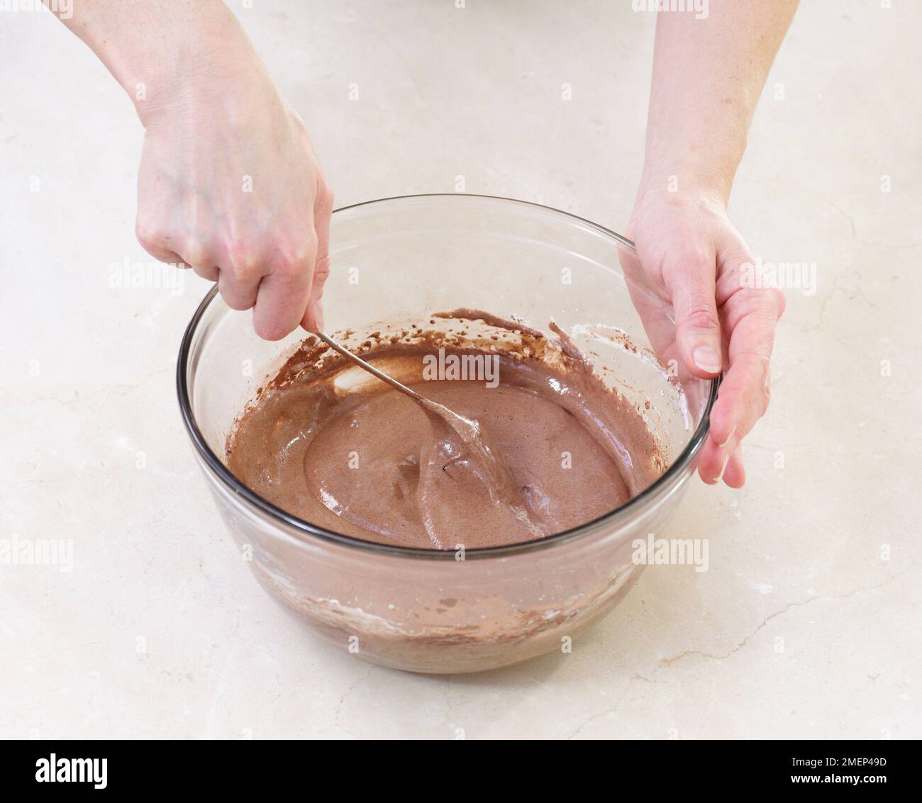 Folding together egg whites, yolks and cocoa, making Chocolate Chestnut ...