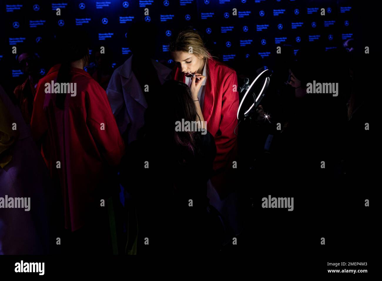 A model backstage wears a creation by Spanish designer Ulises Merida ...