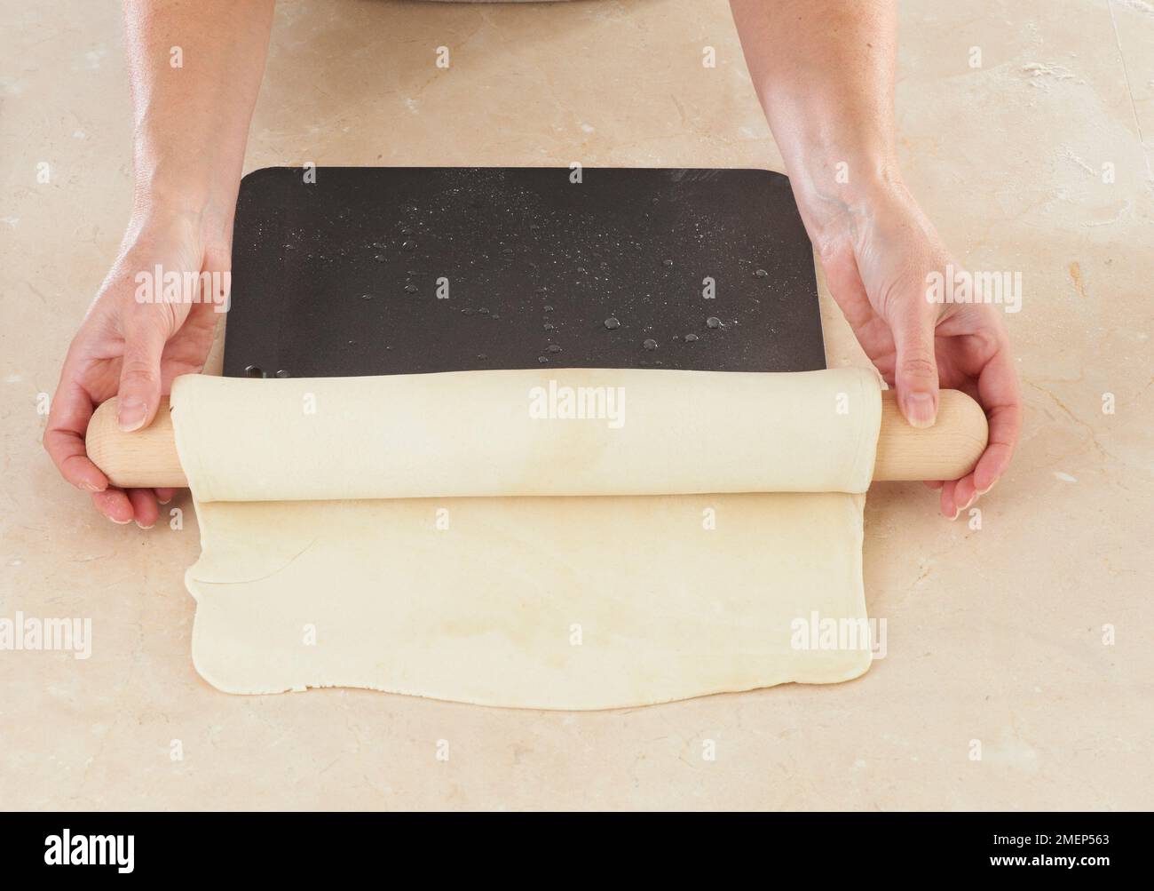 Making Chestnut Millefeuilles, rolling dough around rolling pin and ...