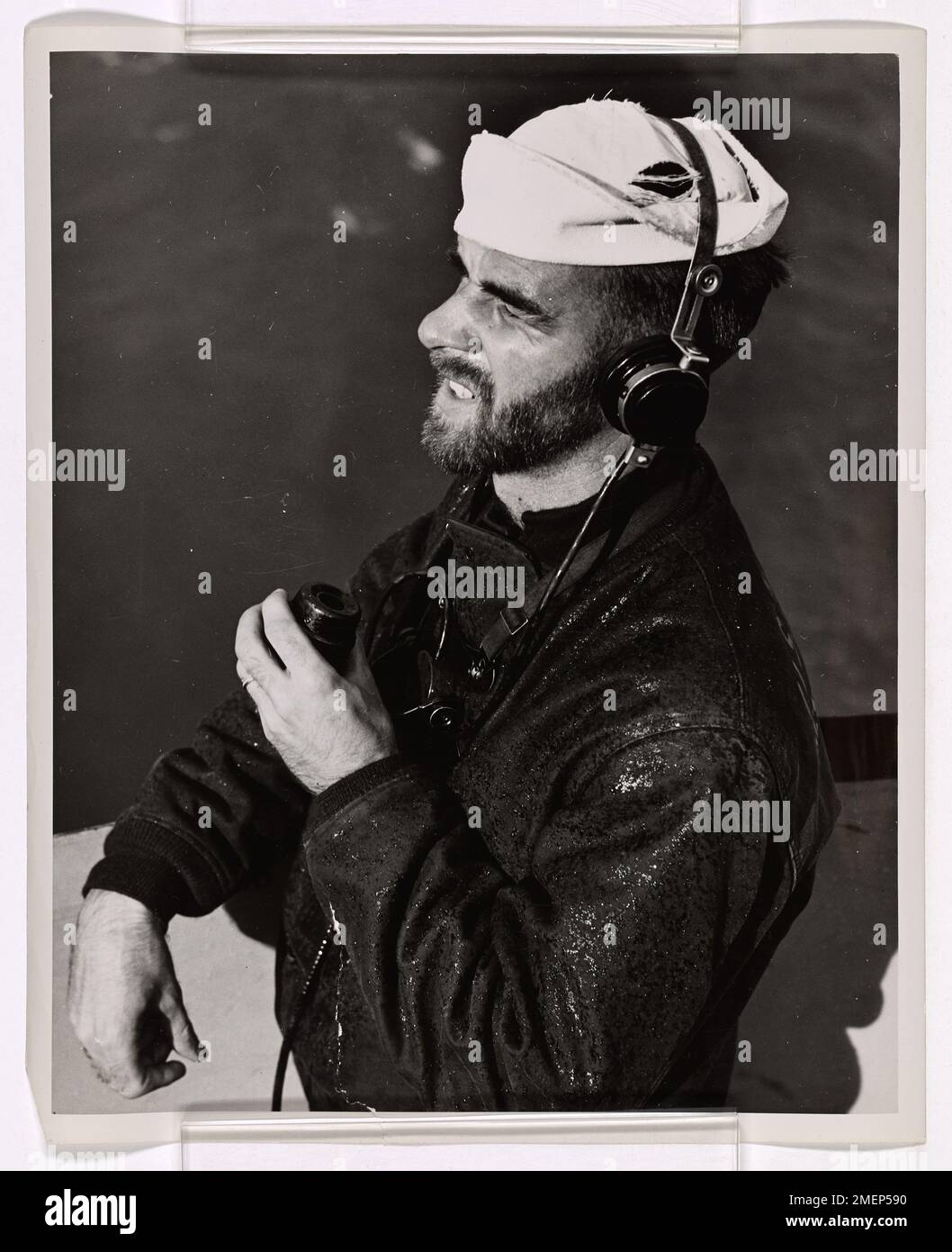 Coast Guardsman Jack P. Smith is depicted in action as he transitions ...