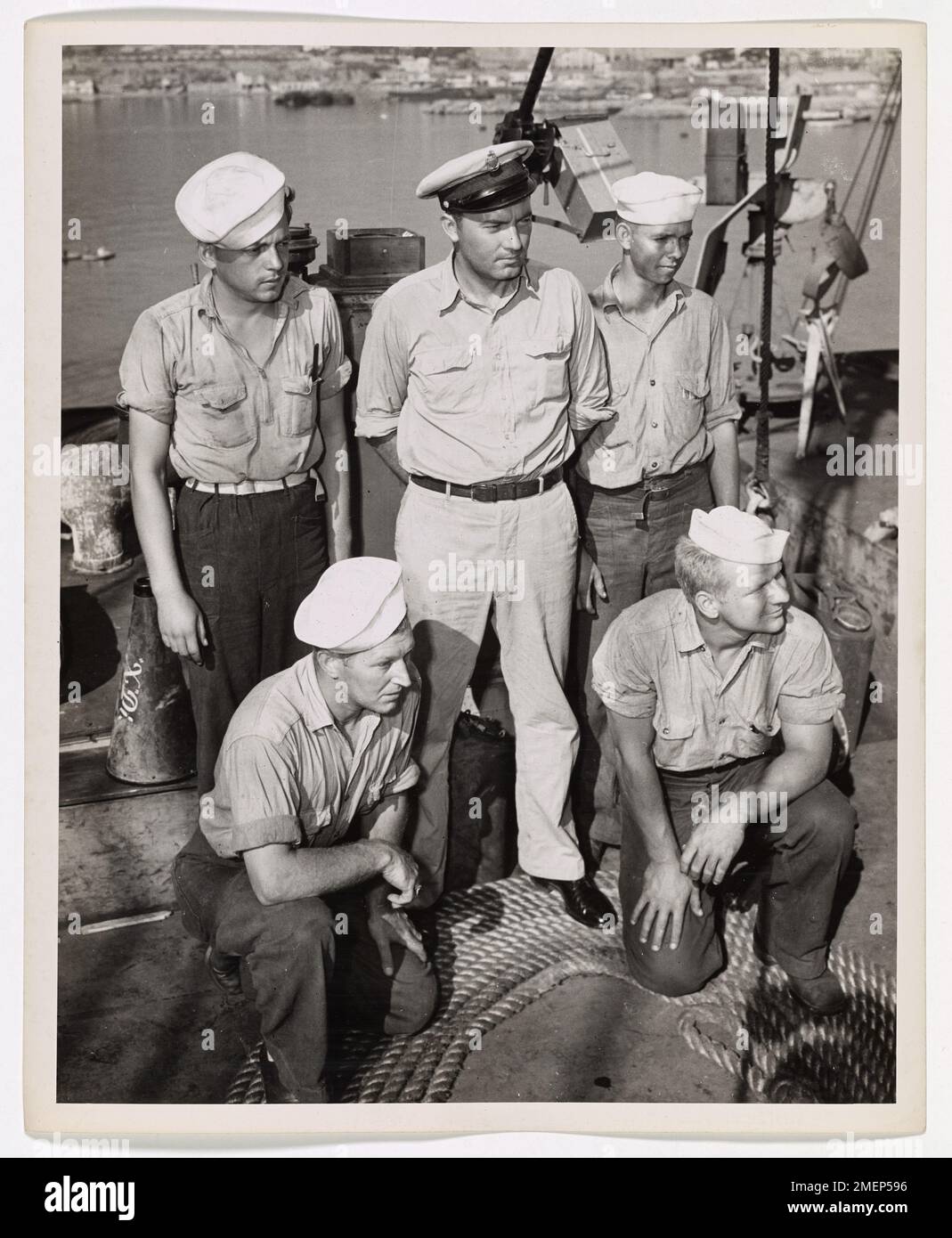 Under heavy enemy fire at Sicily and Salerno beachheads, a Coast Guard ...