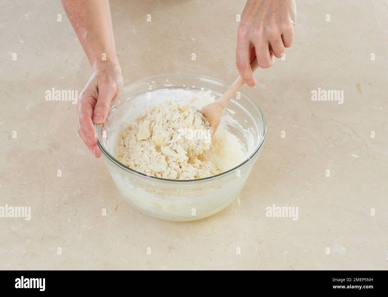 Making Shortbread, stirring in flour and cornflour Stock Photo - Alamy
