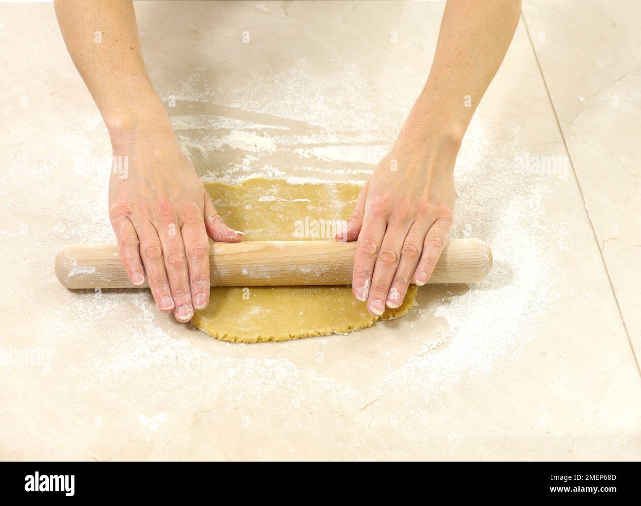 Rolling out the pastry hi-res stock photography and images - Alamy