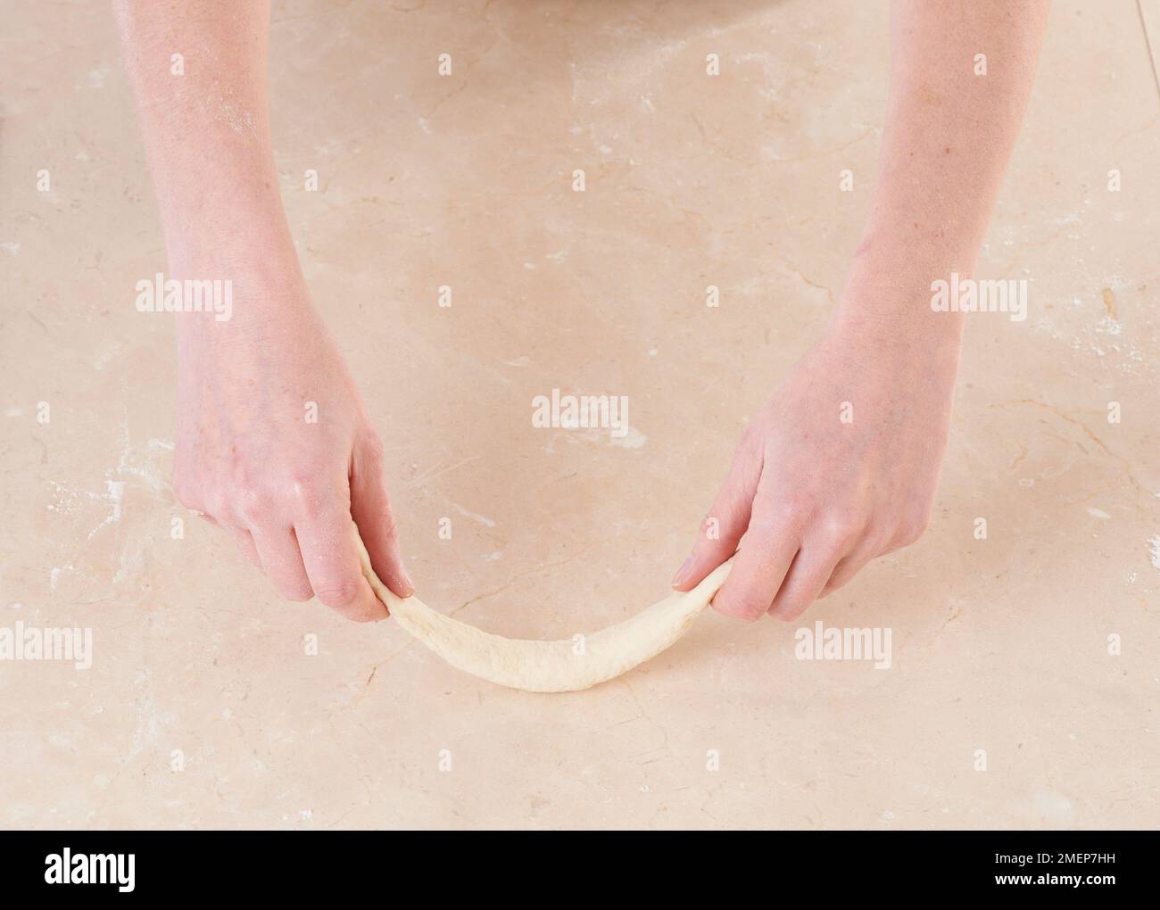 Hand shaping dough hi-res stock photography and images - Alamy