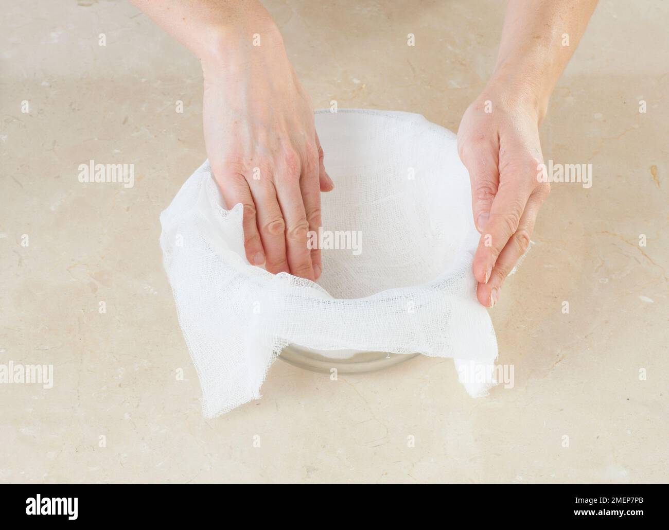 Making Sourdough bread, lining bowl with piece of cloth Stock Photo - Alamy