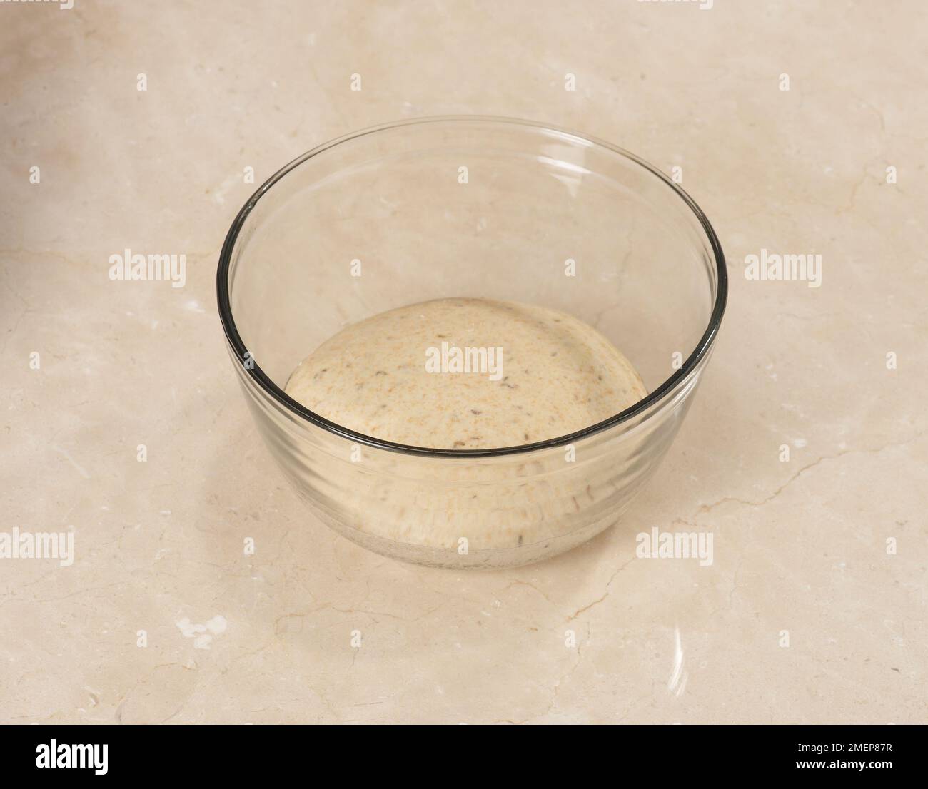 Pitta bread dough rising in bowl Stock Photo - Alamy