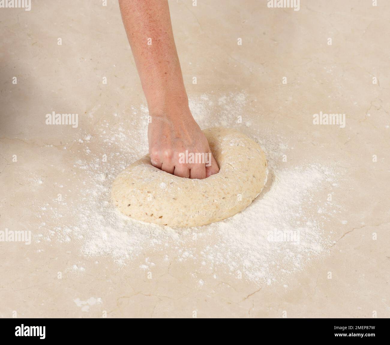 Turning the bread hi-res stock photography and images - Alamy