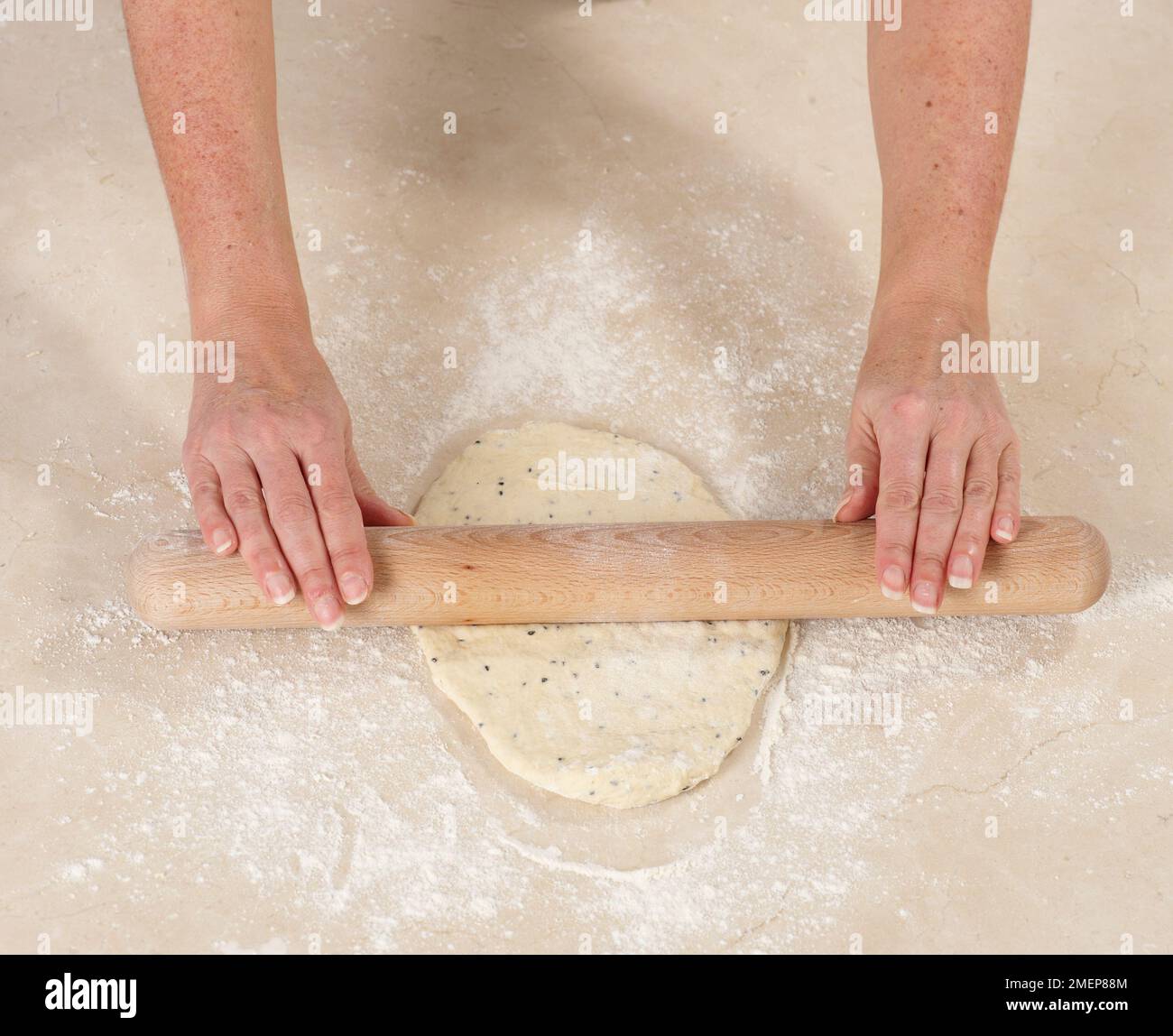 Making Naan Bread, rolling out dough Stock Photo - Alamy