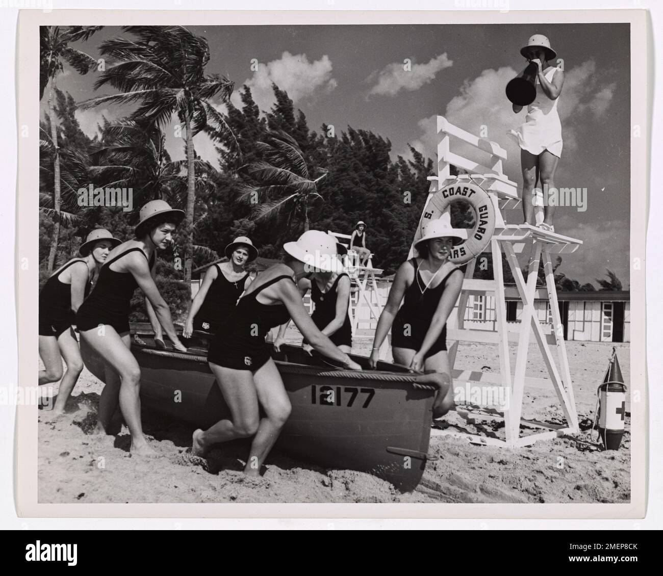 Surfman. This image depicts a group of SPARs pulling a boat over the ...