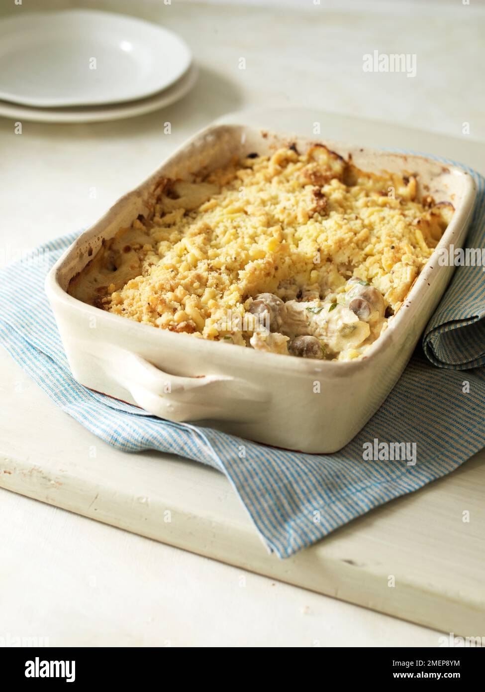 Gluten free chicken crumble in casserole dish Stock Photo - Alamy