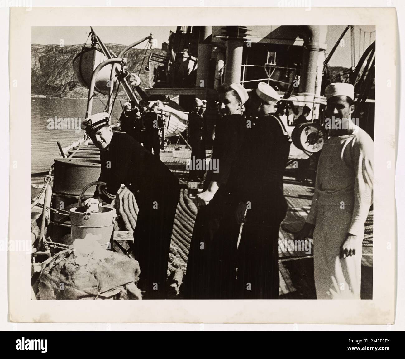 Photographs of Sailors on a Boat. This picture shows sailors on a boat ...