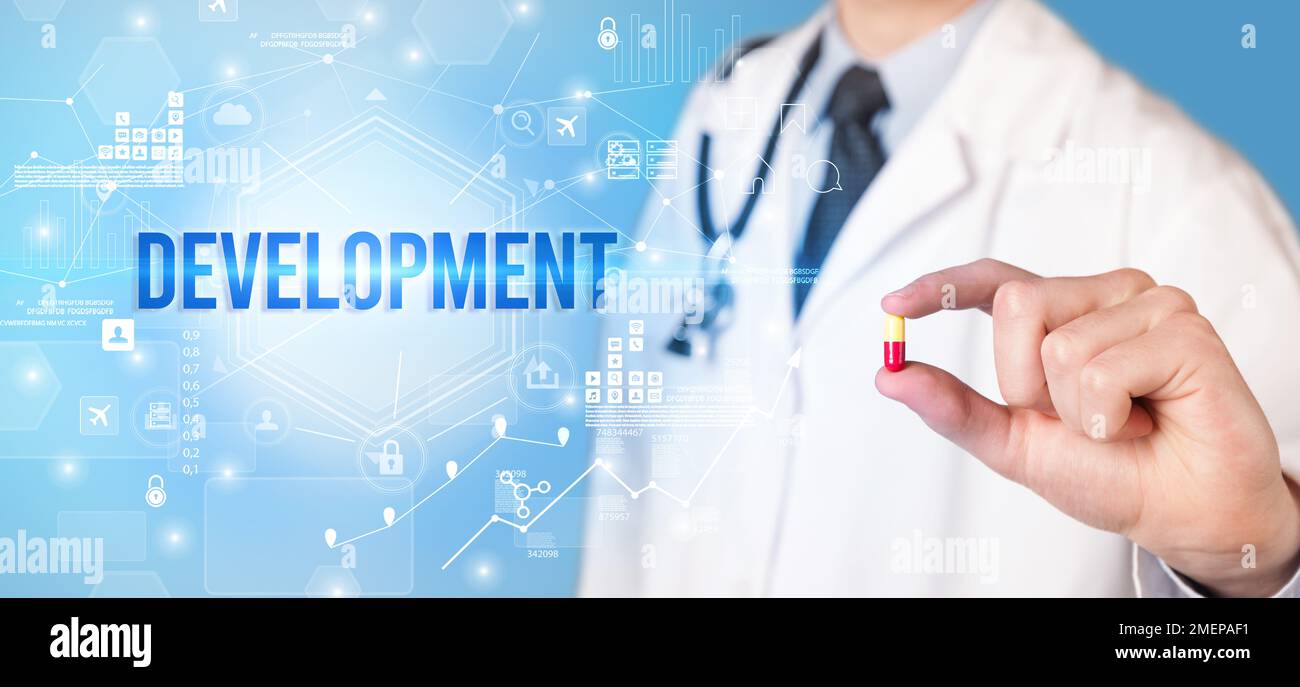 Doctor giving a pill concept Stock Photo - Alamy