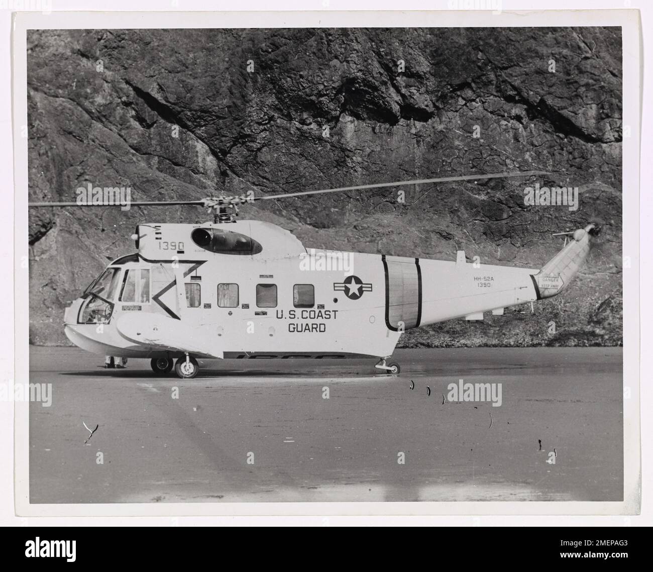 A Coast Guard helicopter performs a rescue operation, saving Lance ...