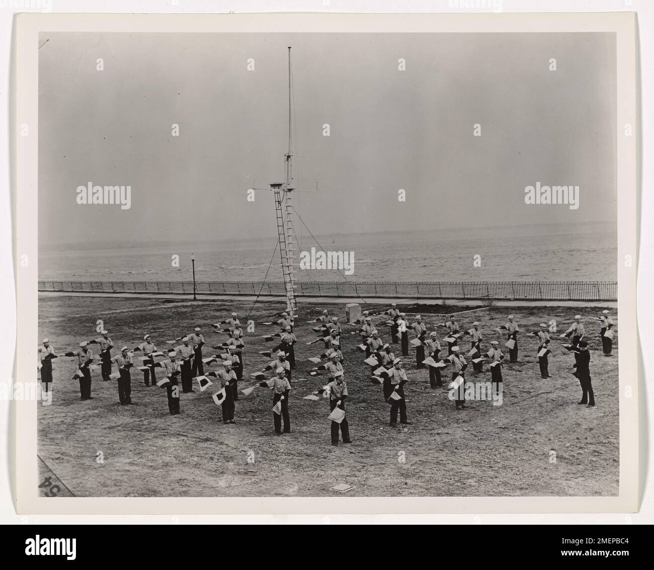 Photograph of Enrollees Working With Flags. This image depicts ...