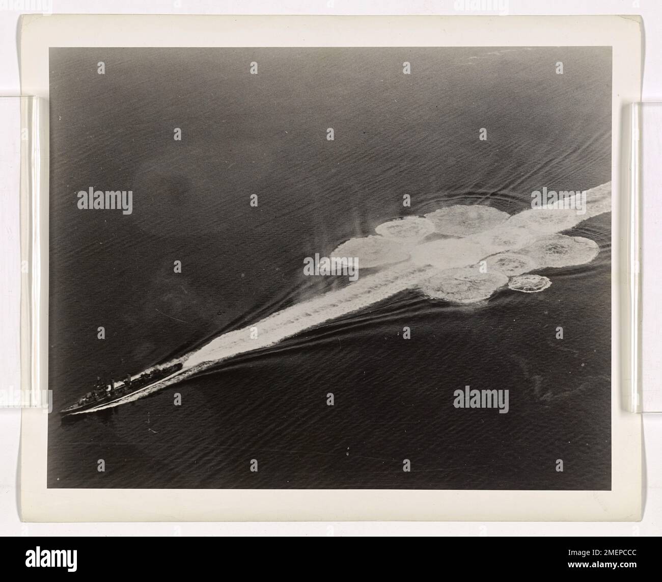 Anti-submarine Action. This image depicts a Navy destroyer which worked ...